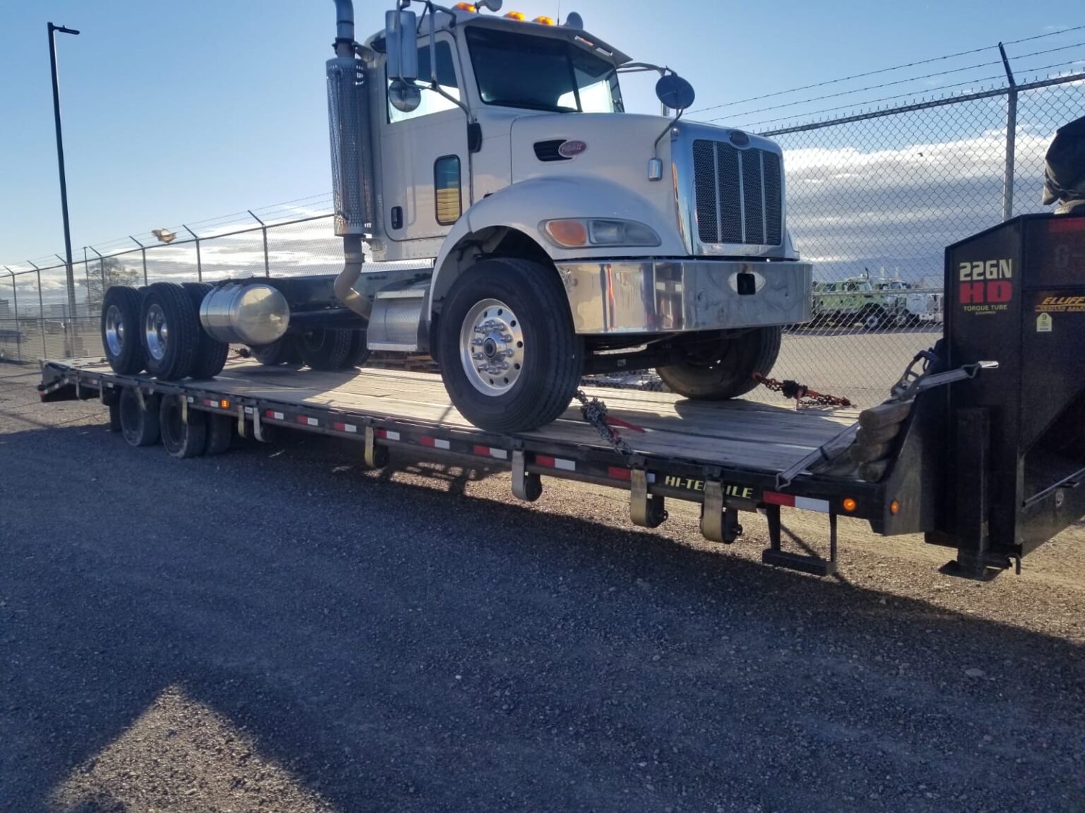How to Load an Inoperable Semi Truck on a Trailer - Heavy Equipment ...